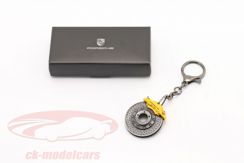 Porsche sleutelhanger remschijf geel WAP0503700PSAB WAP0503700PSAB